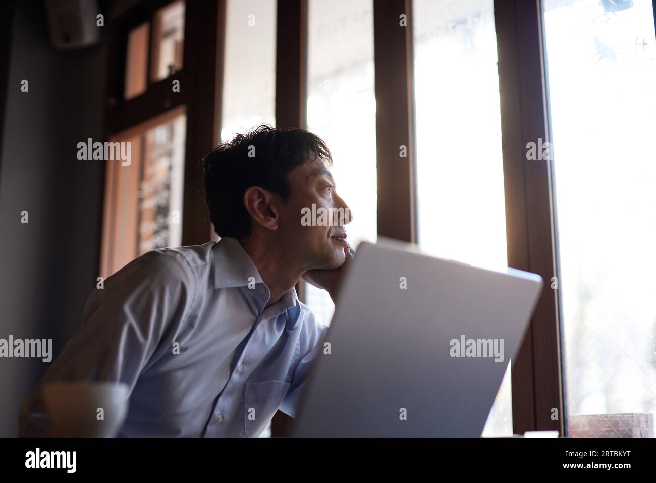 Stressed Japanese man Stock Photo - Alamy