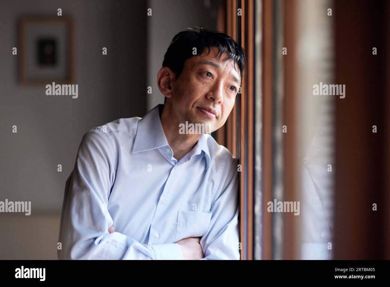Japanese man portrait indoor Stock Photo - Alamy