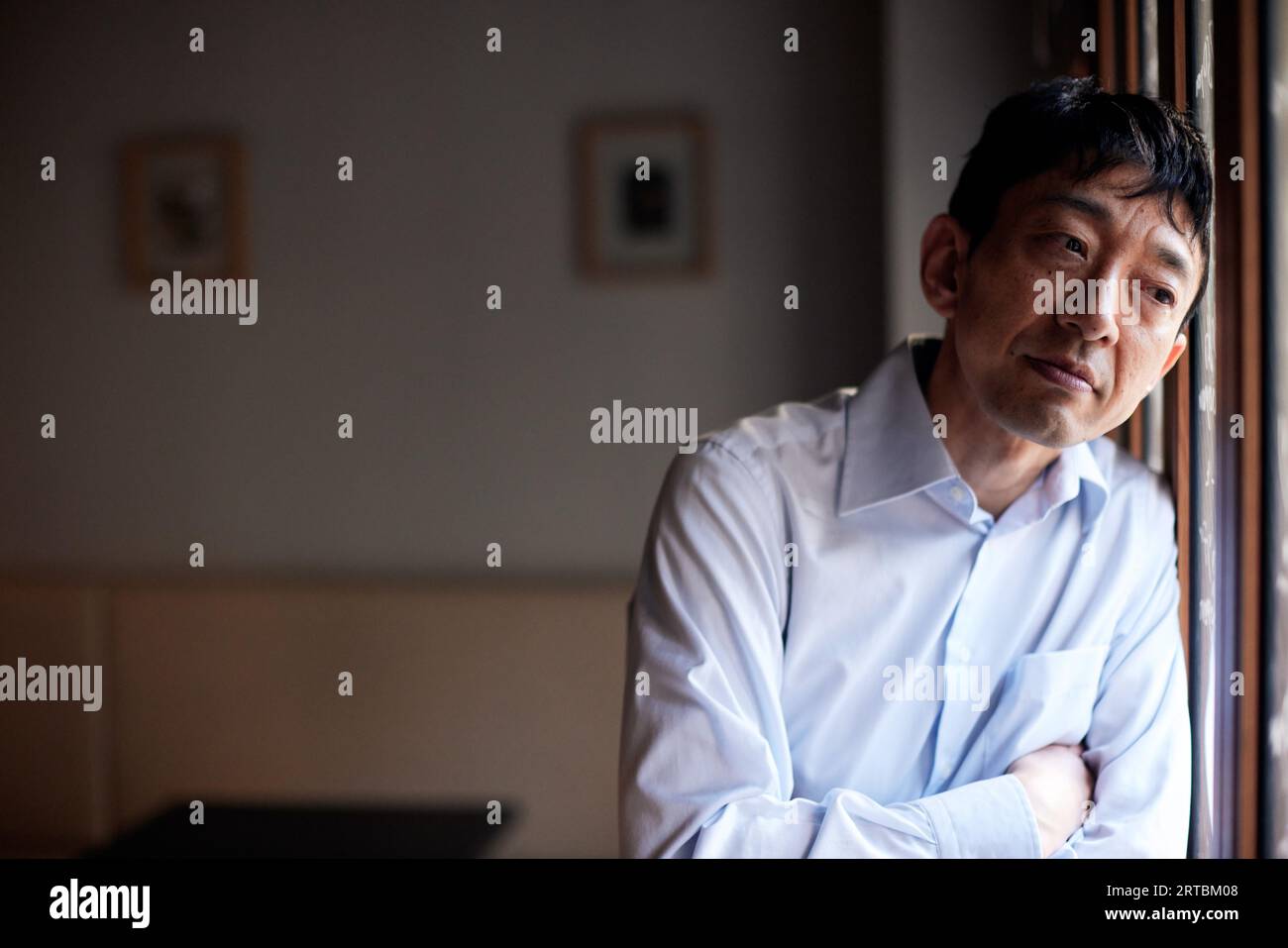 Stressed Japanese man Stock Photo - Alamy