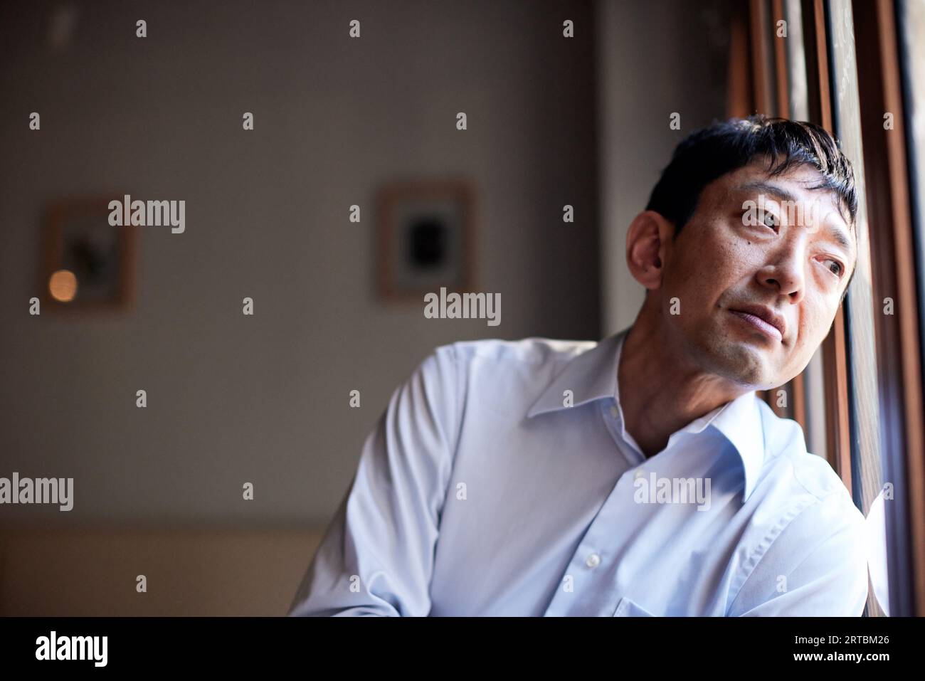 Stressed Japanese man Stock Photo - Alamy
