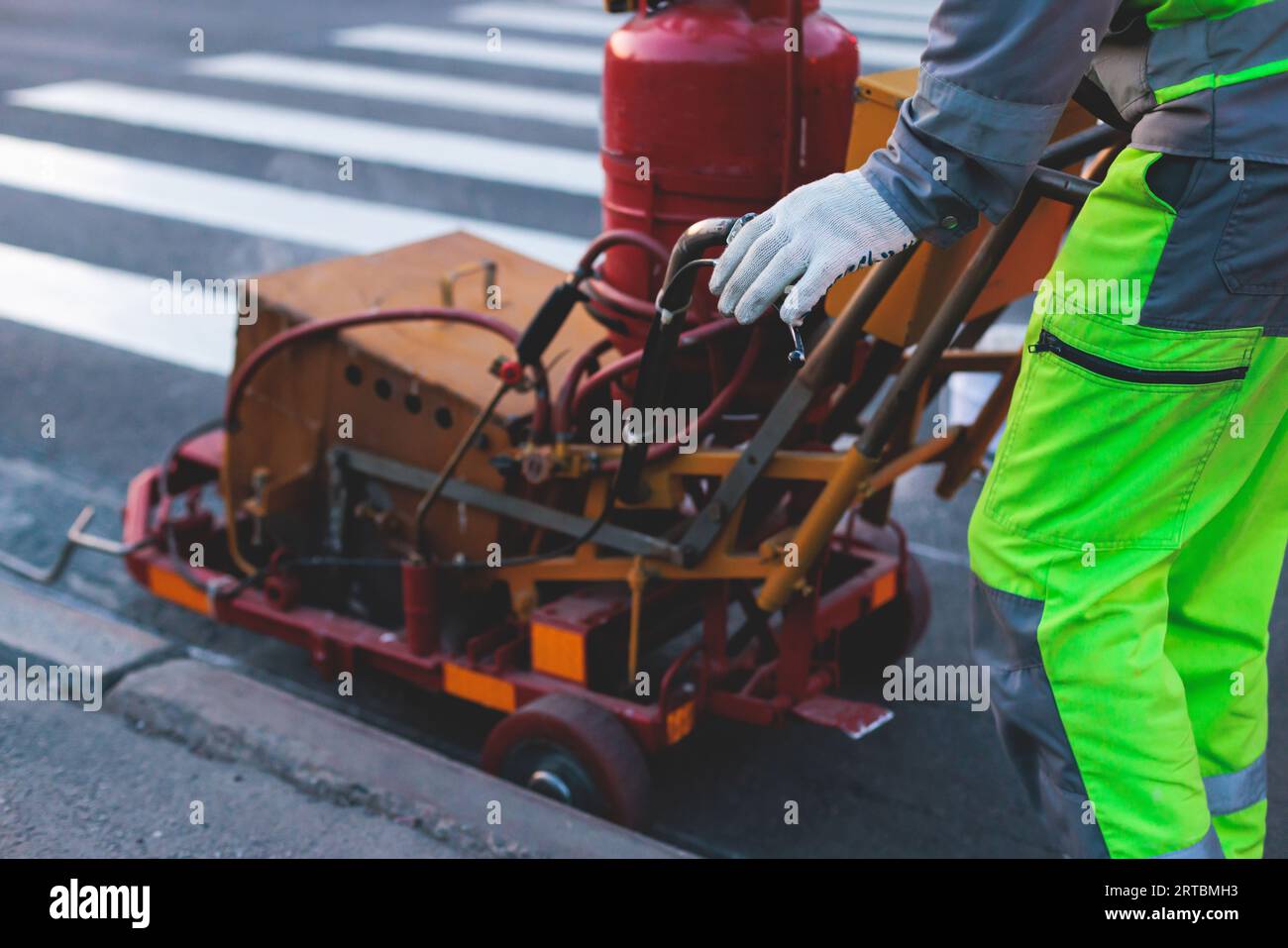 Process of making new road surface markings with a line striping ...