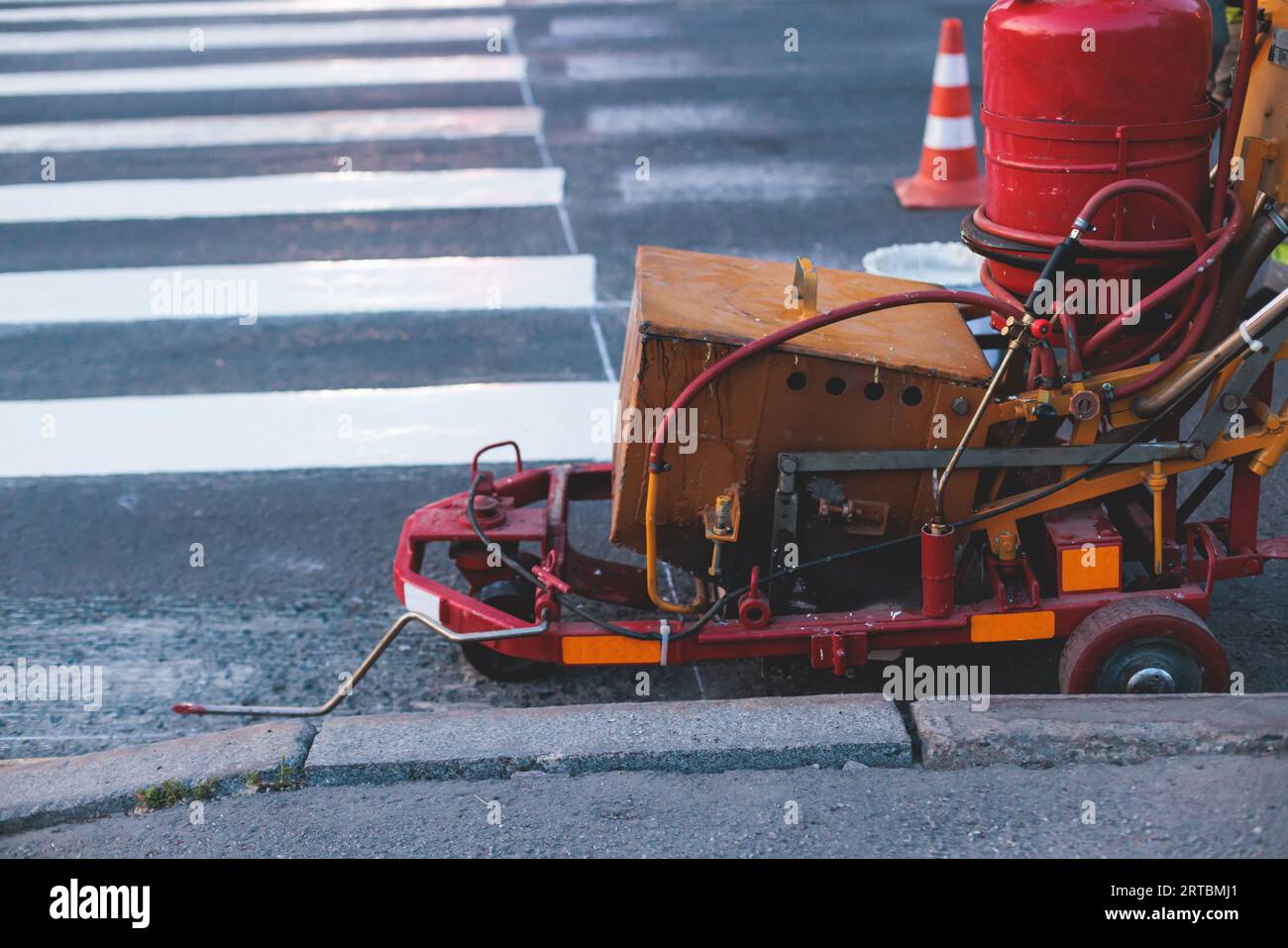 Process of making new road surface markings with a line striping ...