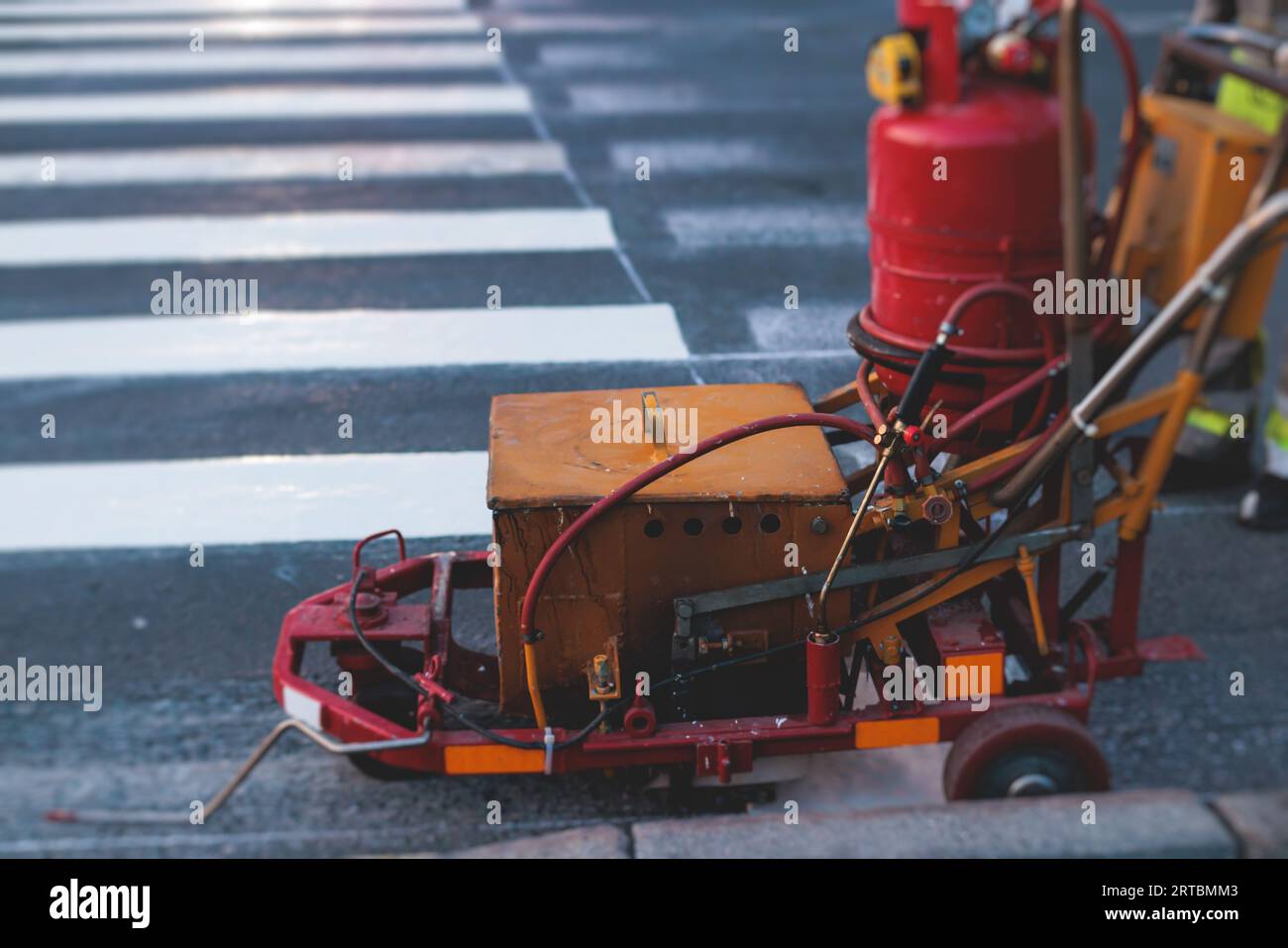 Process of making new road surface markings with a line striping ...