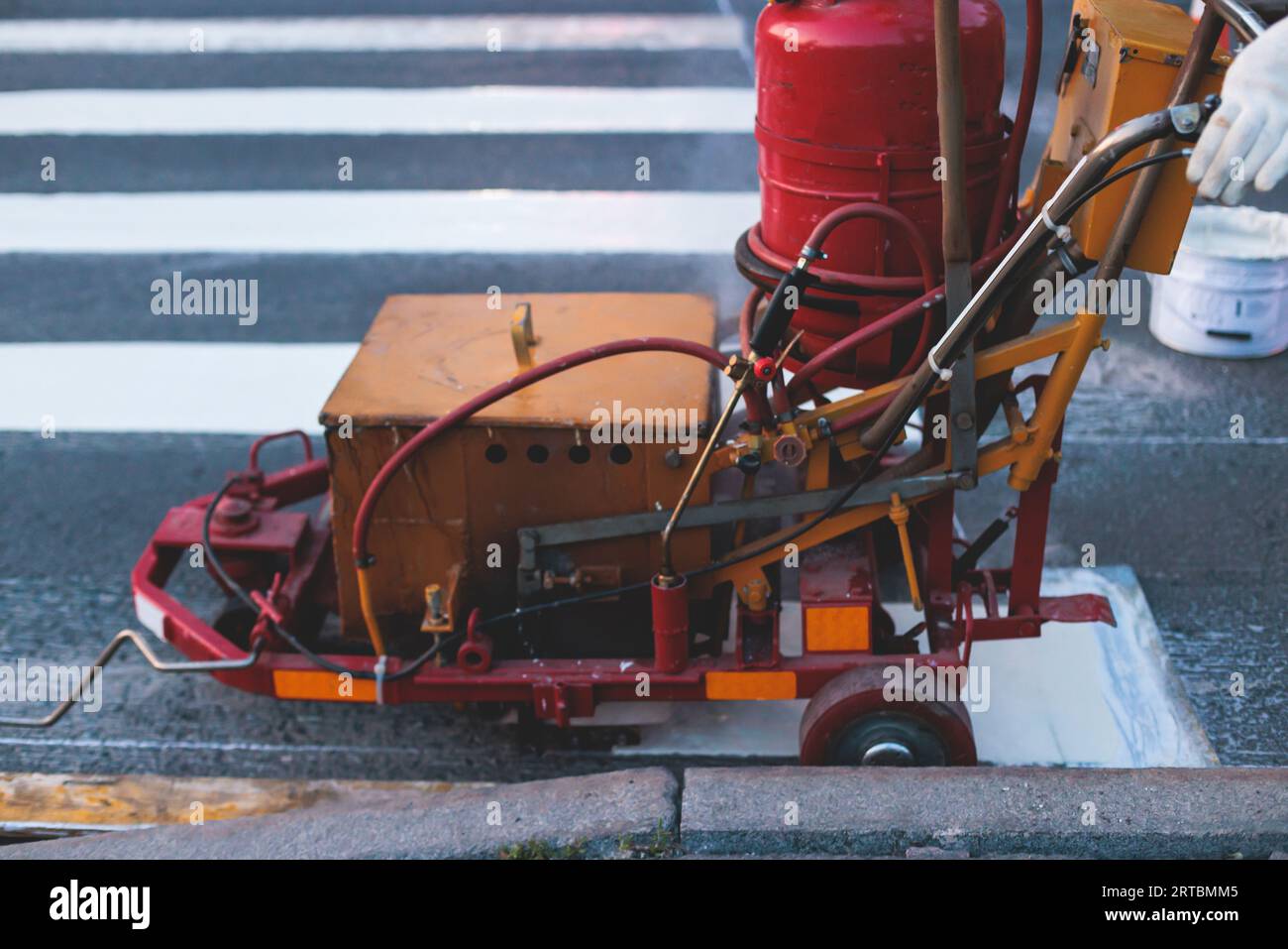 Process of making new road surface markings with a line striping ...