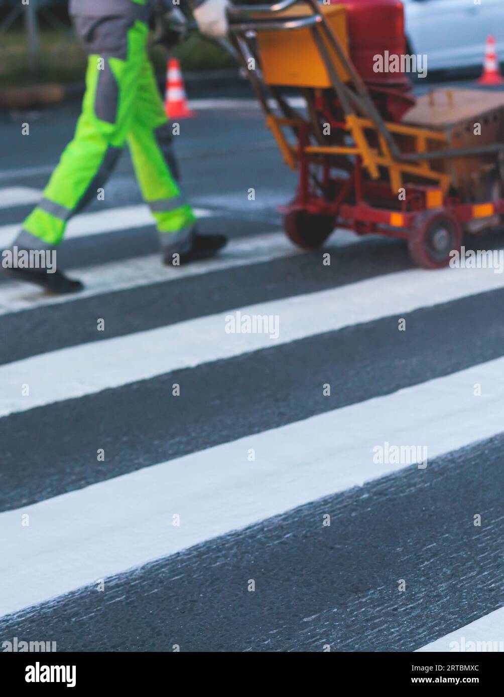 Process of making new road surface markings with a line striping ...