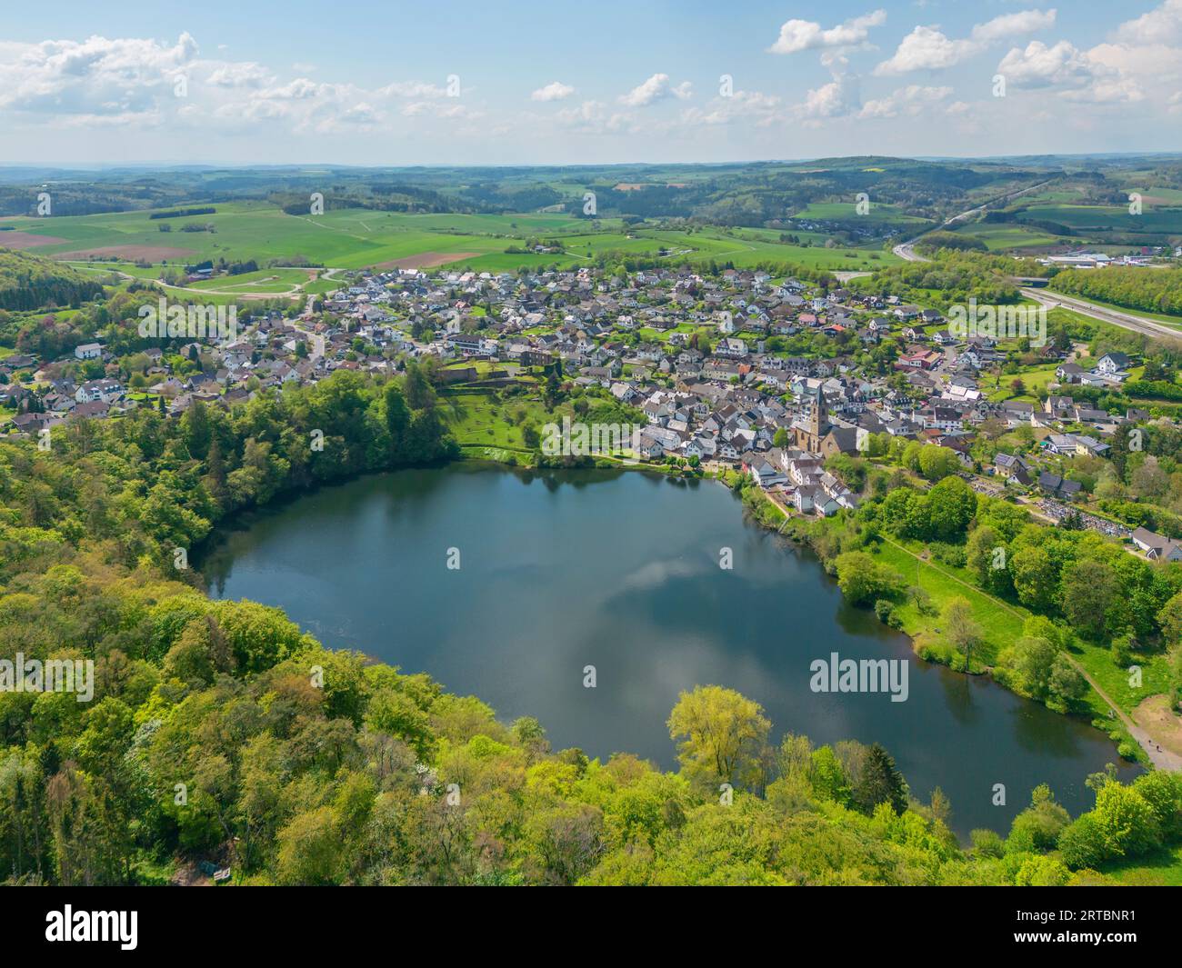 Ulmen Maar with town and parish church of St. Matthias, Ulmen, Eifel ...