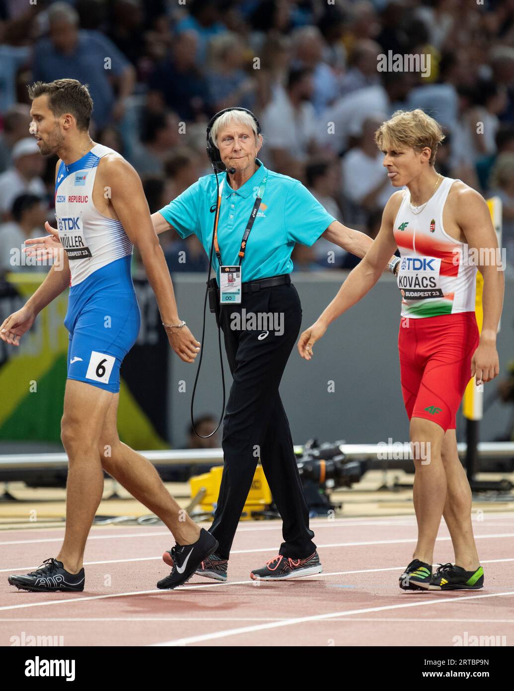 Jane Marie Edstrom (Official NTO) helping athletes’ of the track after ...