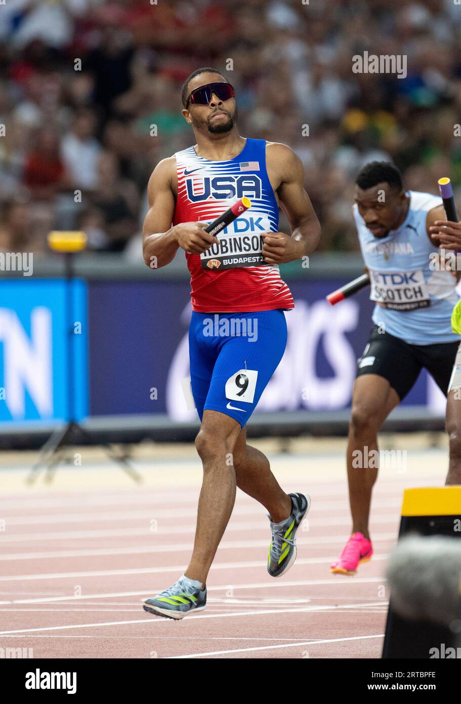 Justin Robinson of the USA competing in the 4x400m relay on day eight ...