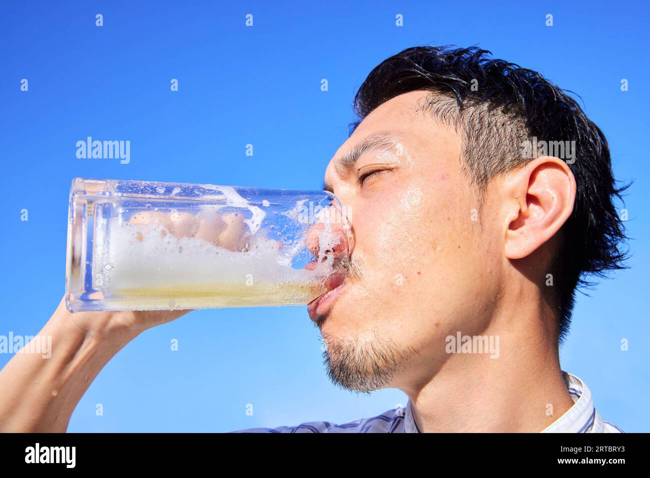 Asian man eyes shut portrait hi-res stock photography and images - Alamy