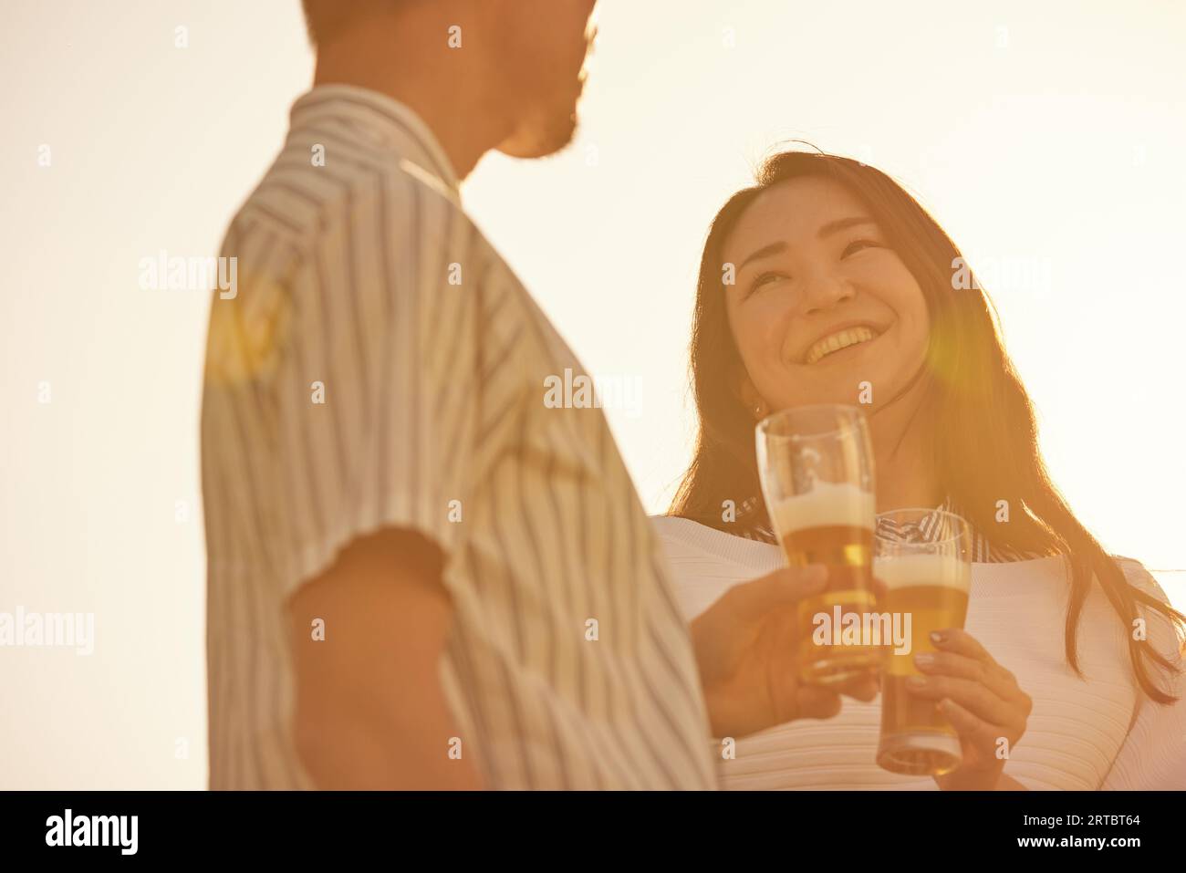 Two people drinking light hi-res stock photography and images - Alamy