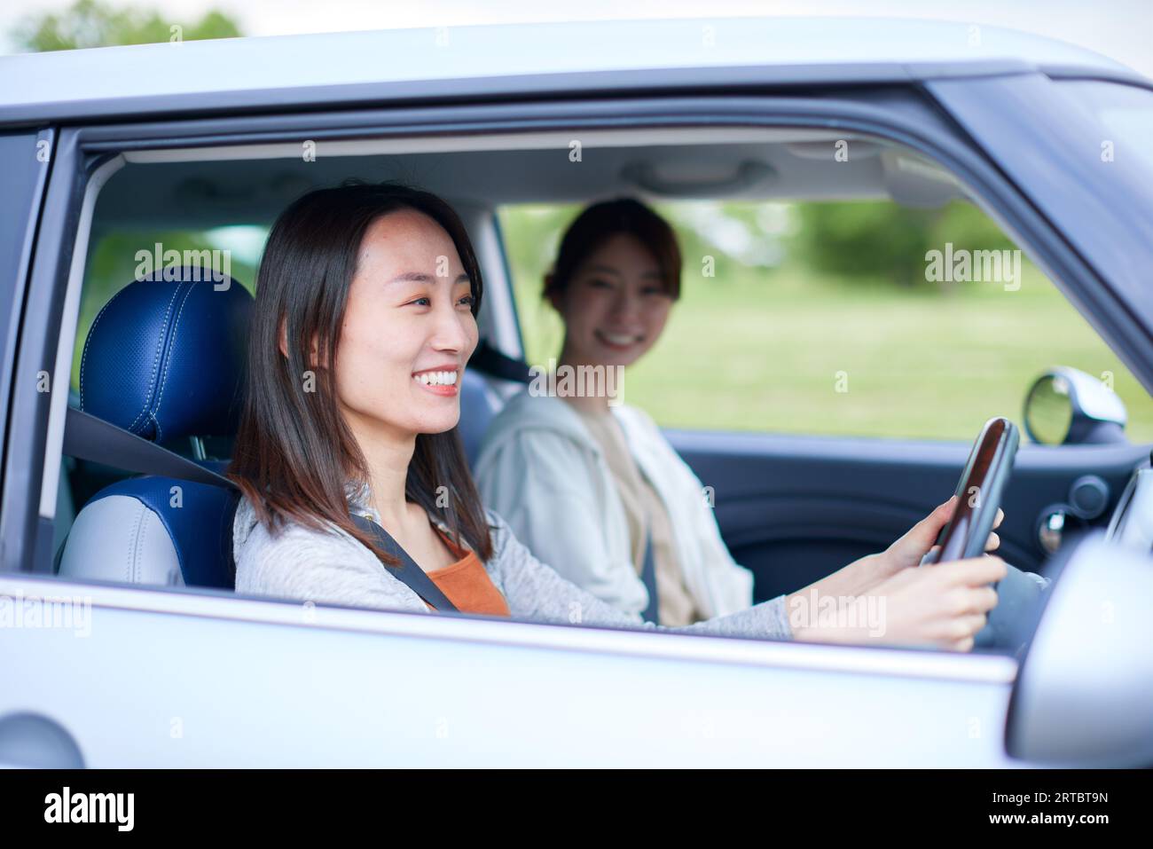 Japanese women driving Stock Photo - Alamy