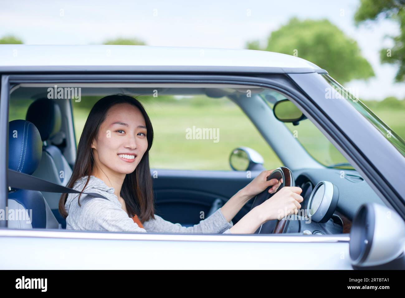 Japanese woman driving Stock Photo - Alamy
