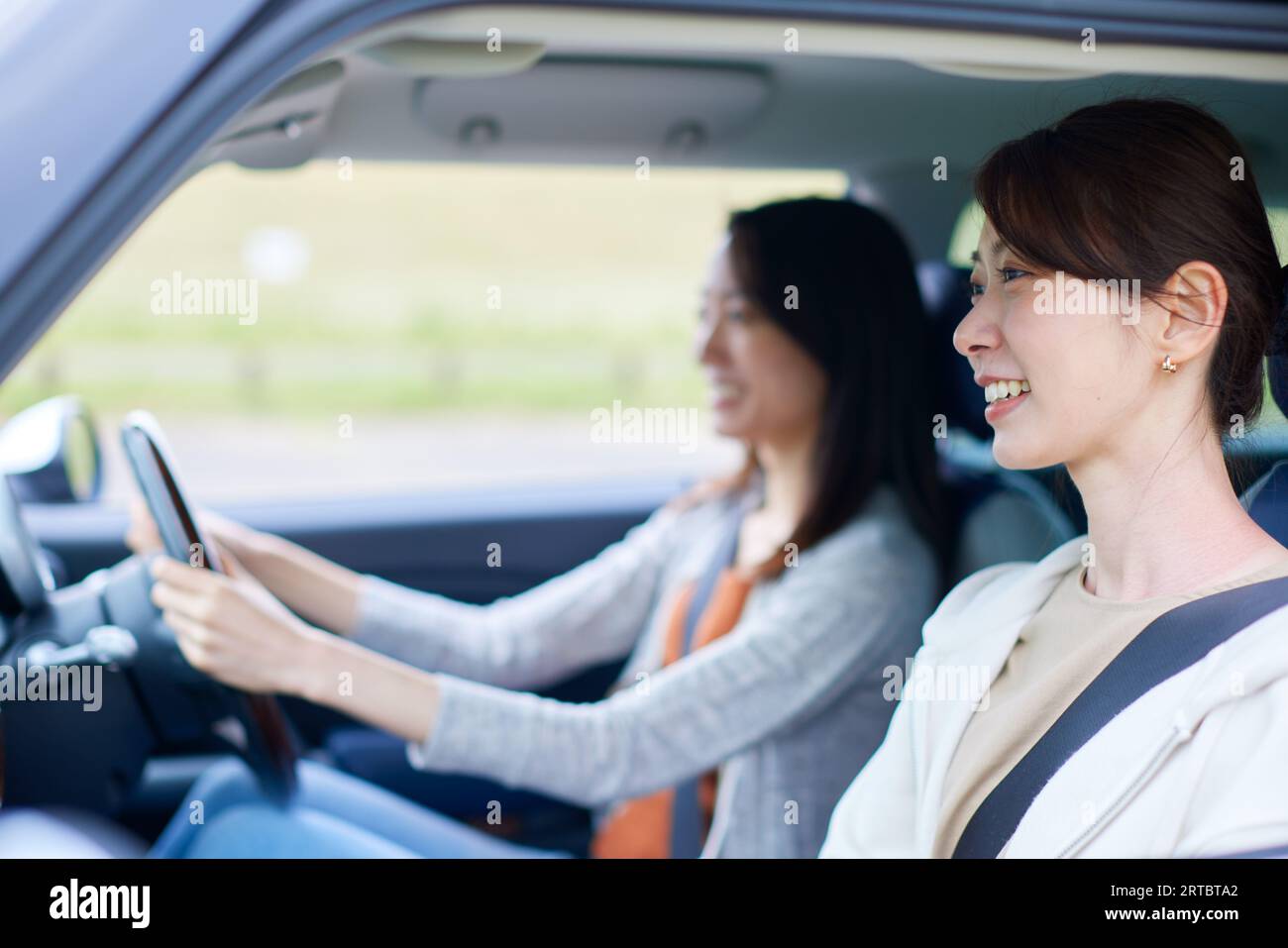 Japanese women driving Stock Photo - Alamy