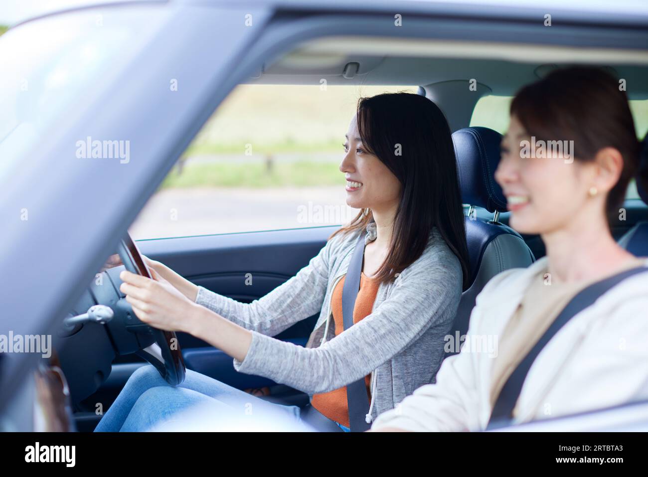 Japanese women driving Stock Photo - Alamy