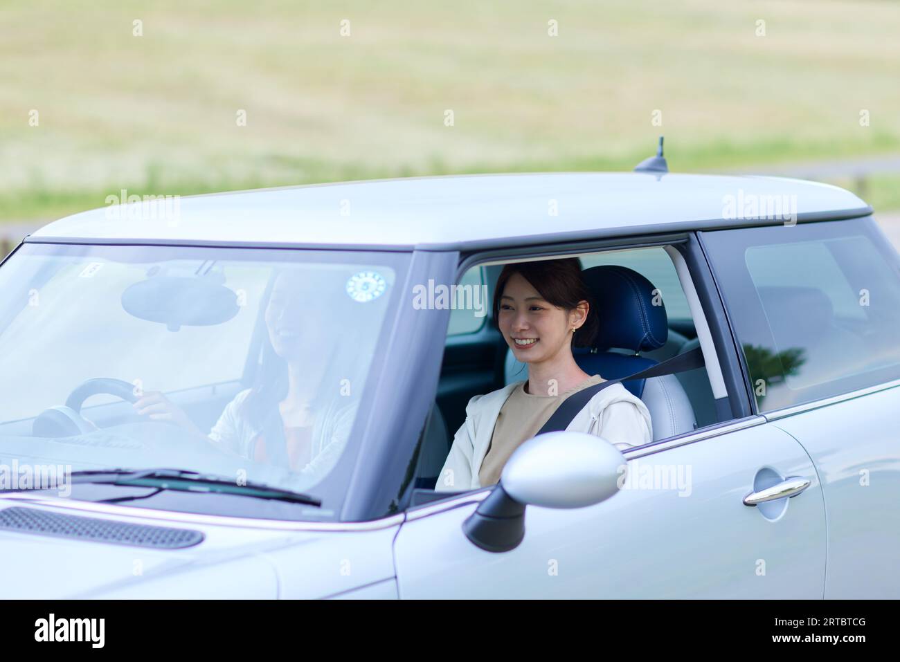 Japanese women driving Stock Photo - Alamy