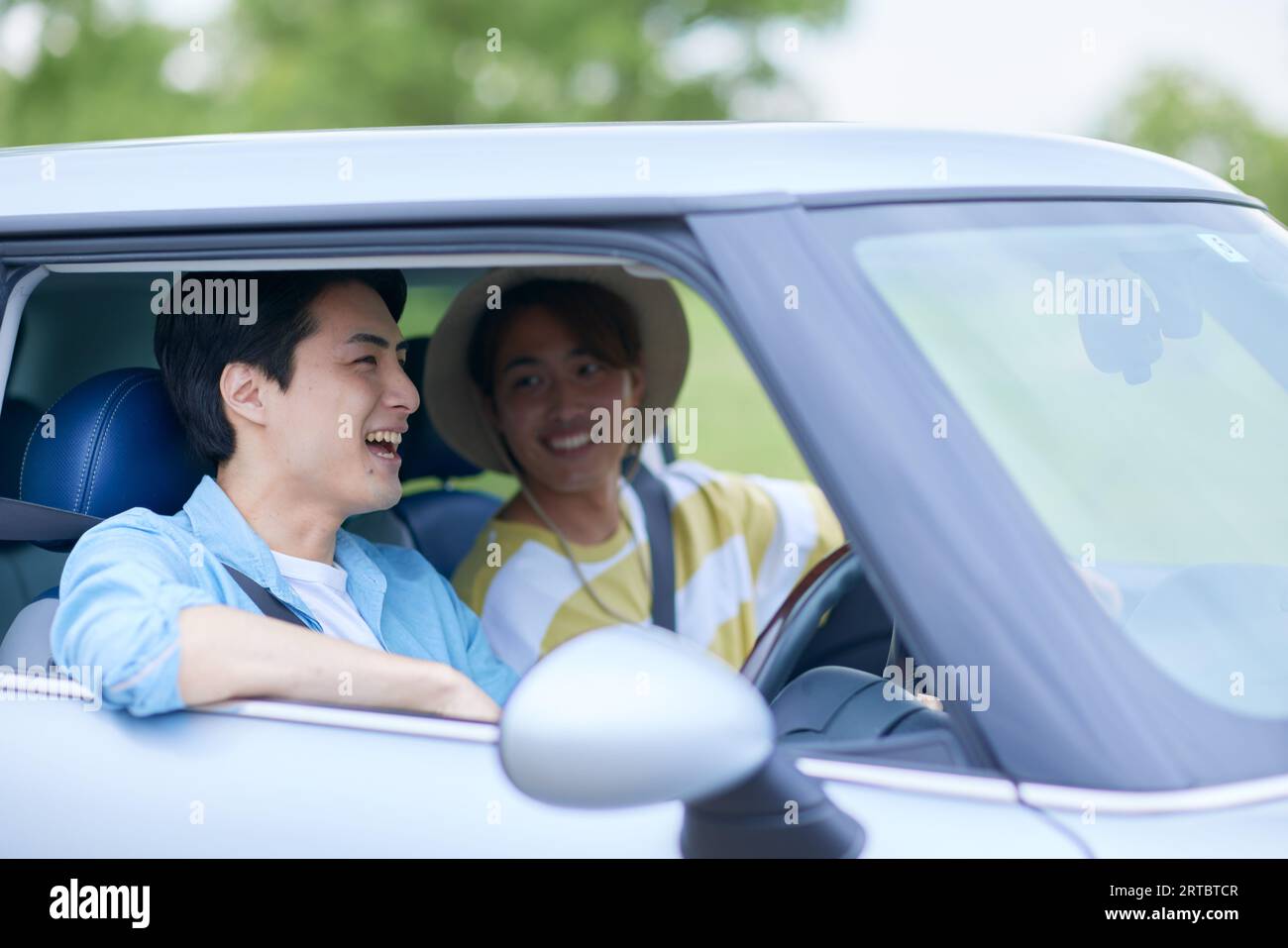 Japanese men driving Stock Photo - Alamy