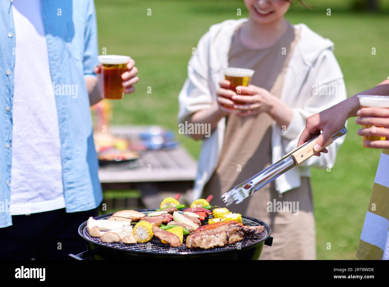 Japanese people having barbecue at city park Stock Photo - Alamy