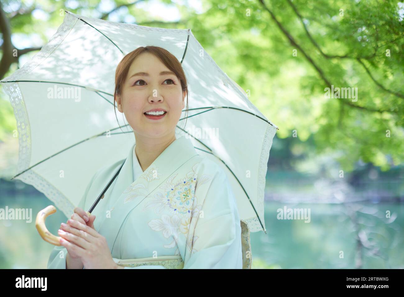 Asian woman sun protection hi-res stock photography and images - Alamy