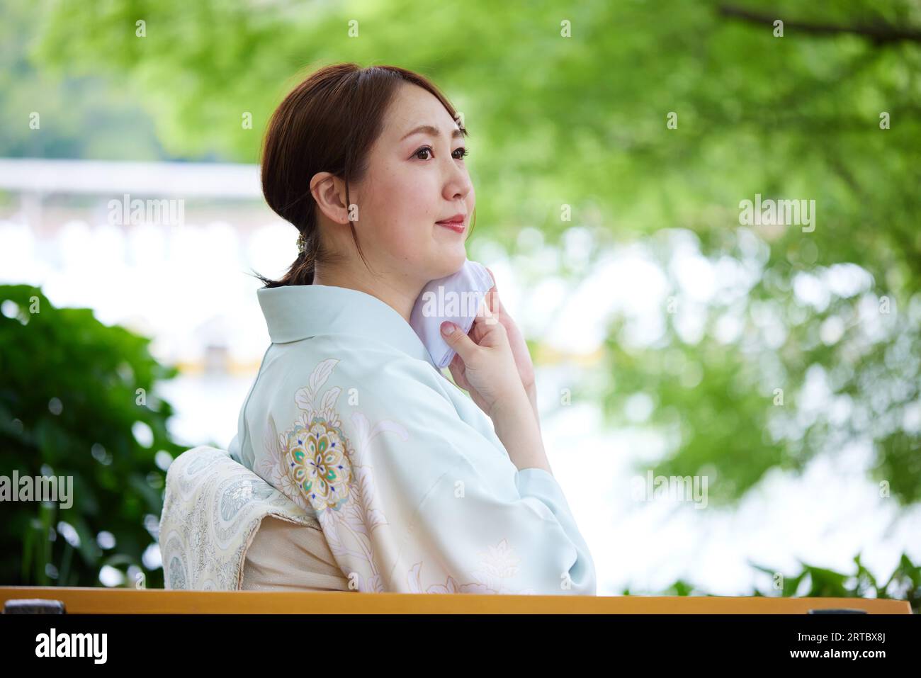 Asian woman in traditional green hi-res stock photography and images ...