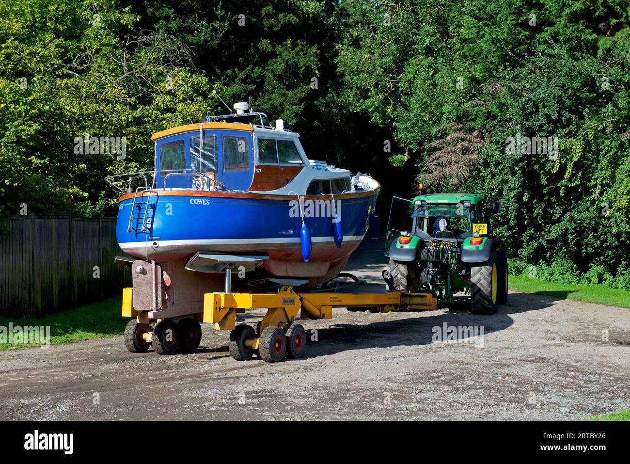 Boat being launched, by tractor, onto the River Ouse, at Acaster Maine, Acaster Malbis, North ...