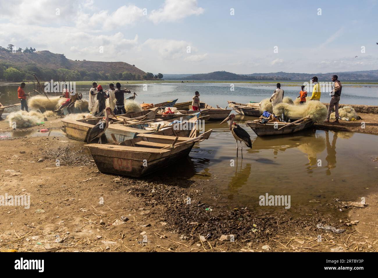 HAWASSA, ETHIOPIA - JANUARY 28, 2020: Fishing boats and nets at the ...
