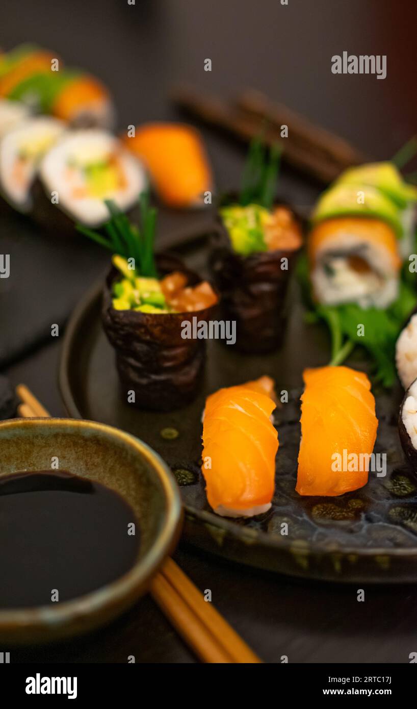 Luxurious and creative Sushi as Nigiri,Futomaki,Gunkan with chopsticks ...