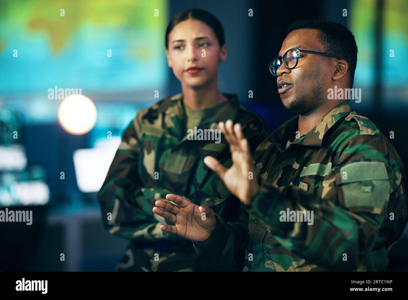 Night, talking and people in army with a strategy, cyber security or ...