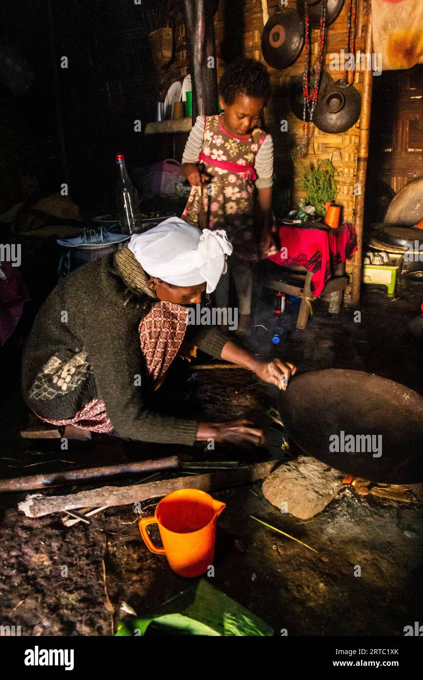 DORZE, ETHIOPIA - JANUARY 30, 2020: Dorze woman is preparing kocho ...