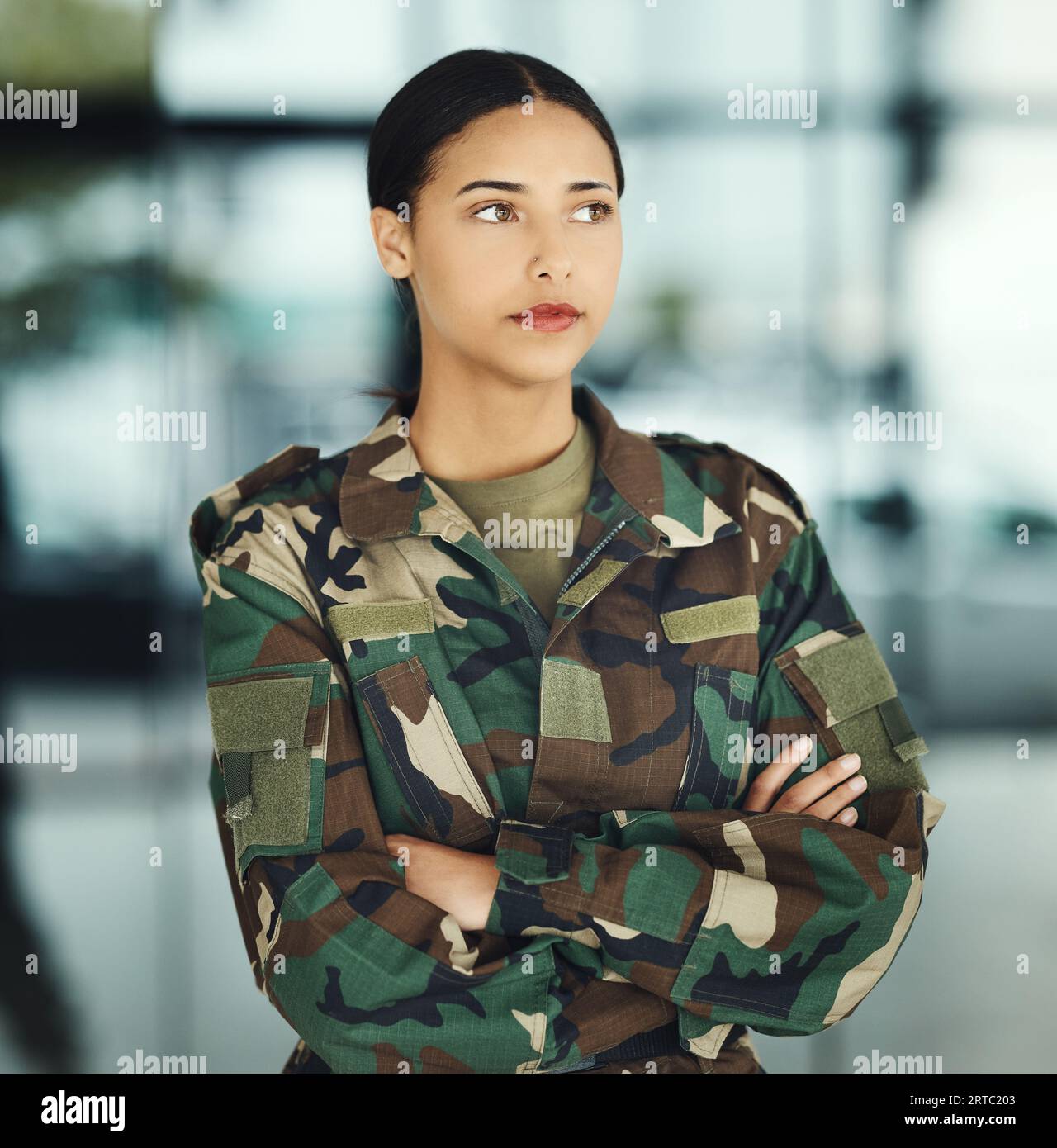 Military, thinking and arms crossed with a woman soldier in uniform for ...