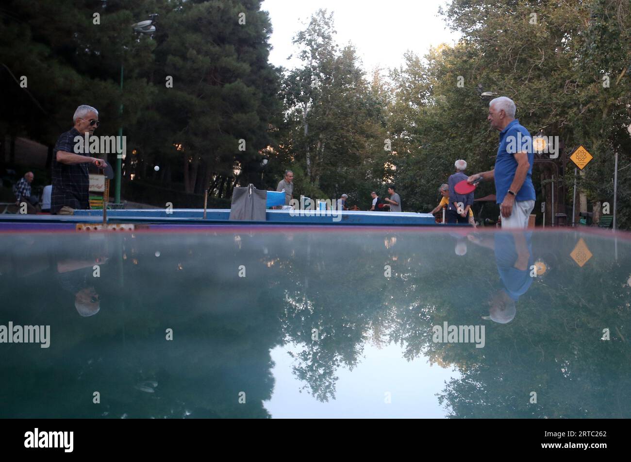 Tehran, Iran. 9th Sep, 2023. People play table tennis at a park in ...
