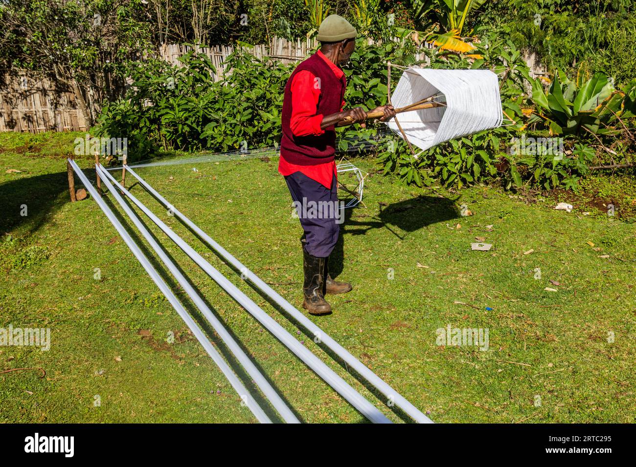 DORZE, ETHIOPIA - JANUARY 30, 2020: Dorze man is showing their ...
