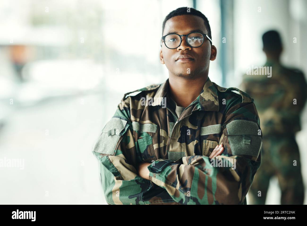 Confident soldier portrait, mockup and arms crossed in army building ...