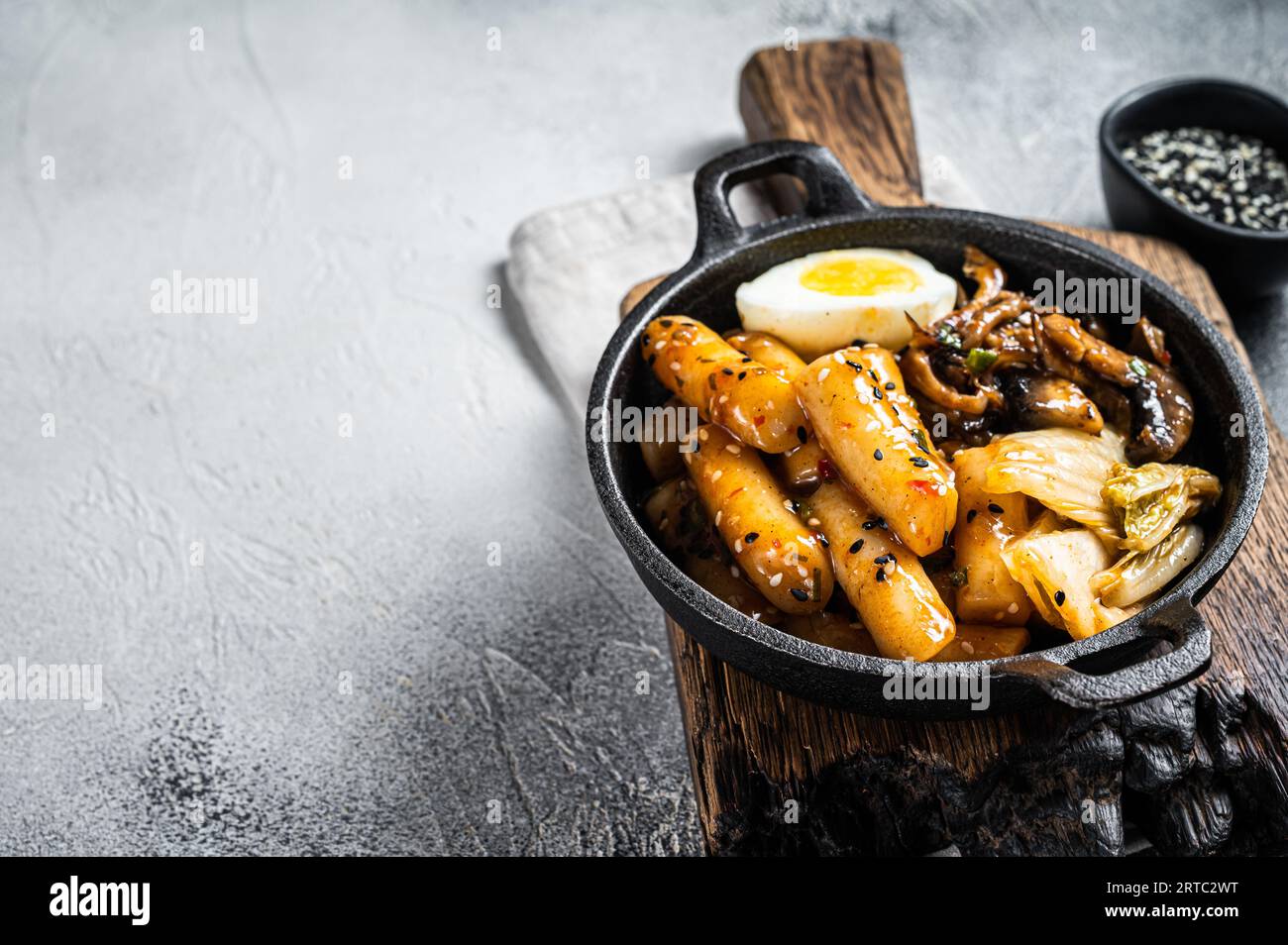 Tteokbokki, Topokki stick rice cake in spicy sauce with egg and ...