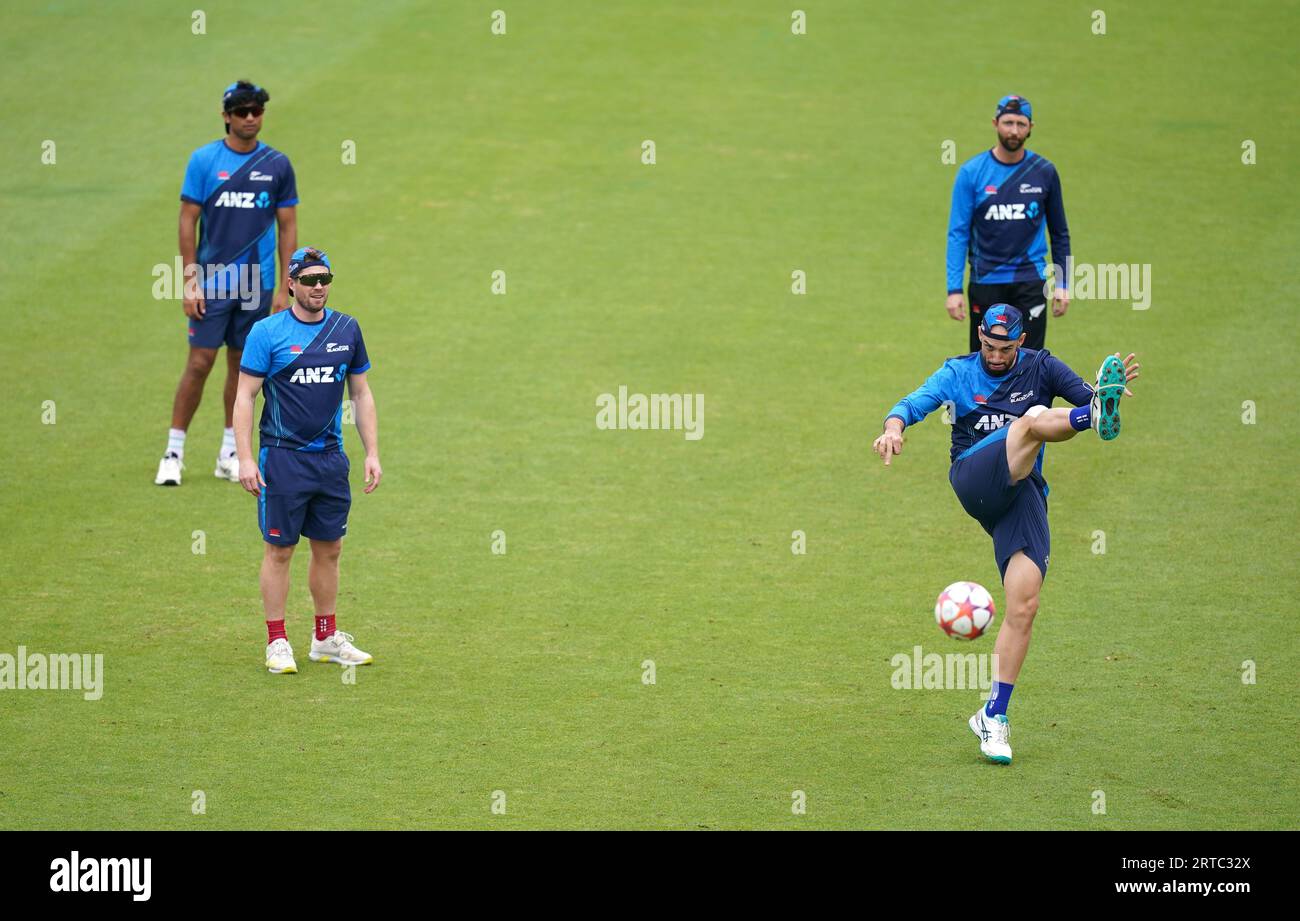 New Zealand's Daryl Mitchell (bottom right) during the nets session at ...