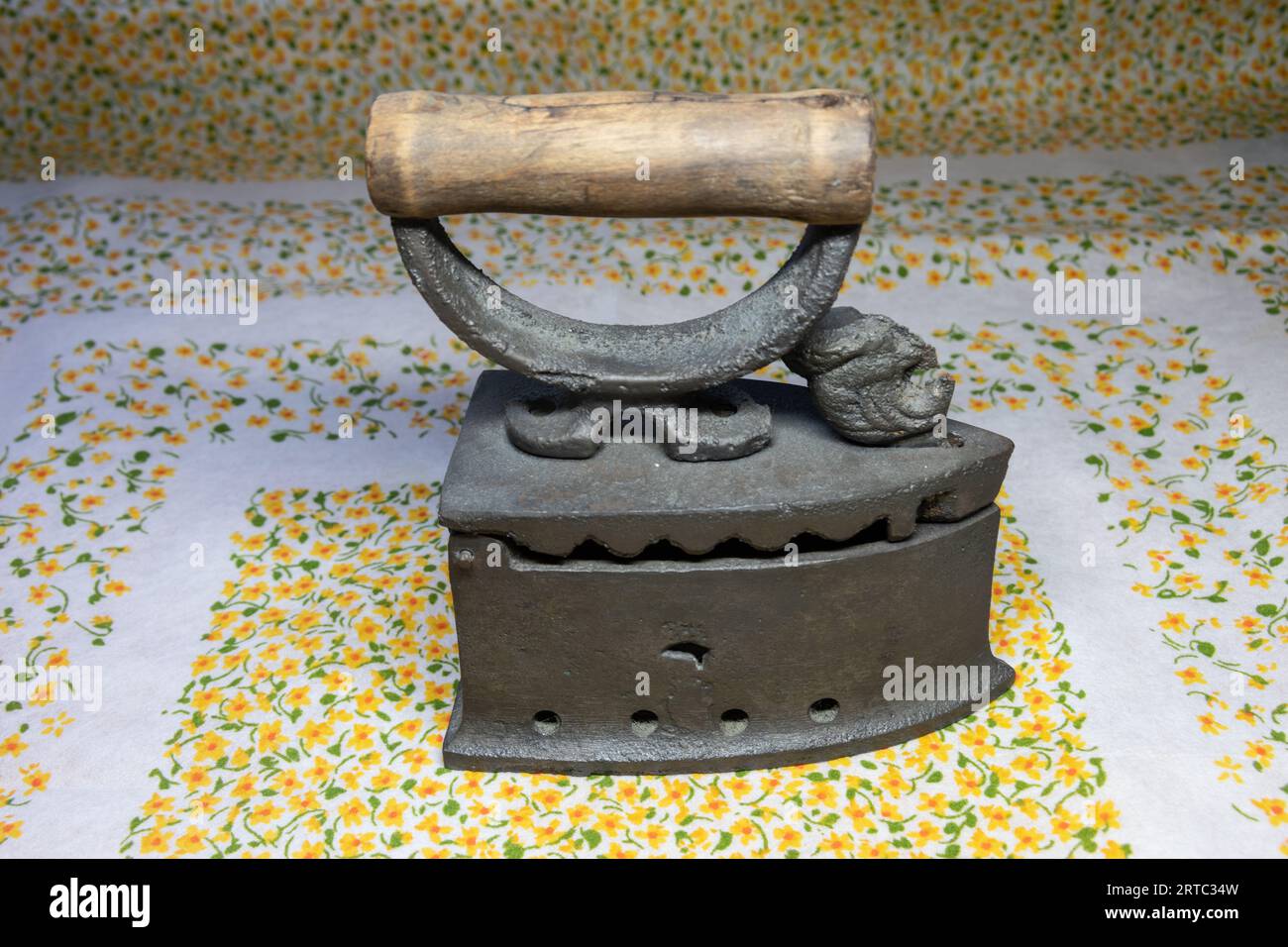 old antique iron iron with coal compartment Stock Photo - Alamy
