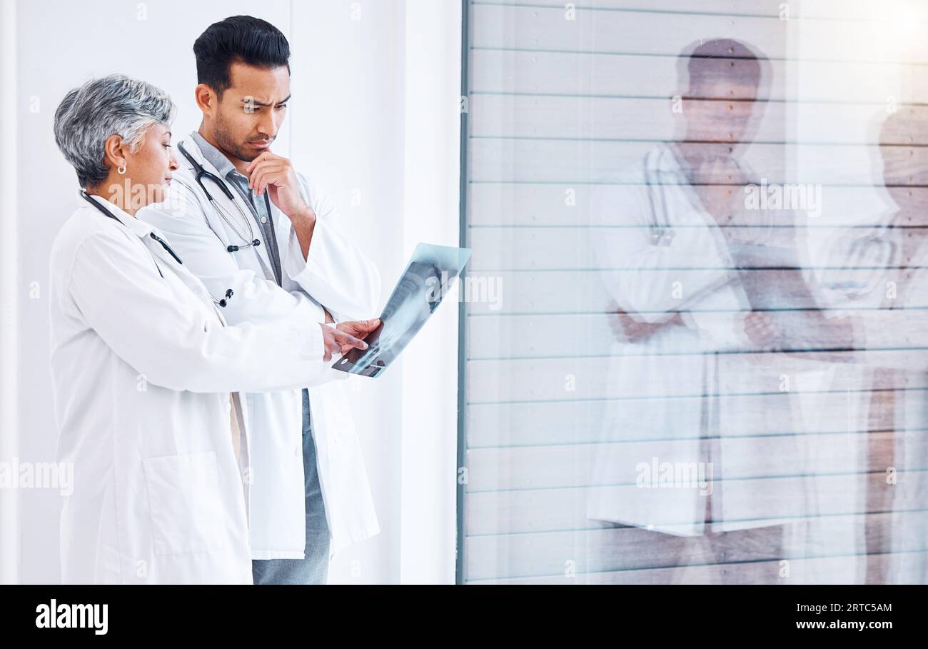 Window, doctors and conversation with scan, healthcare and neurosurgeon ...