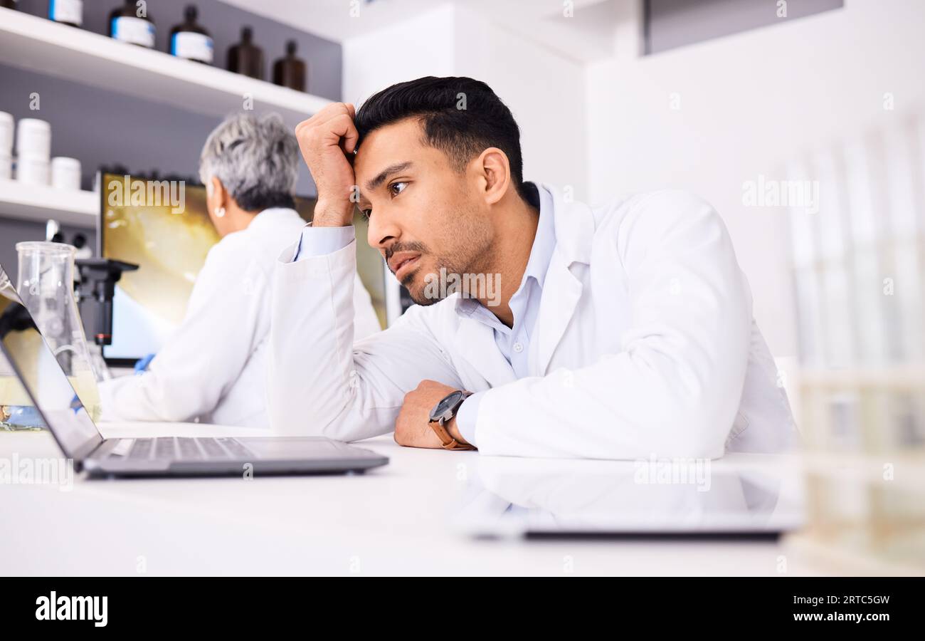 Scientist, stress and headache for computer research, planning and data ...