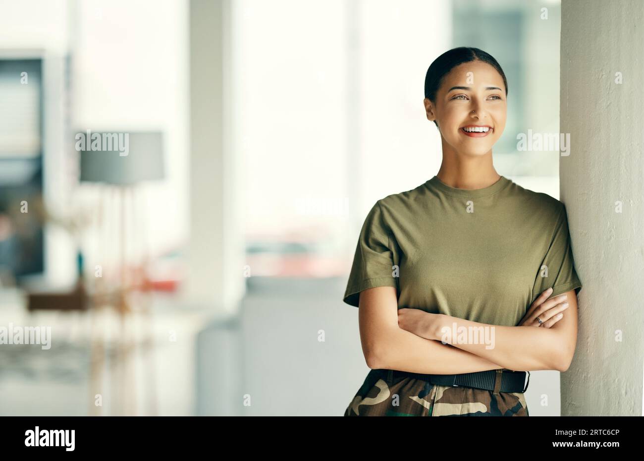 Woman soldier with smile, arms crossed and pride, relax at army ...