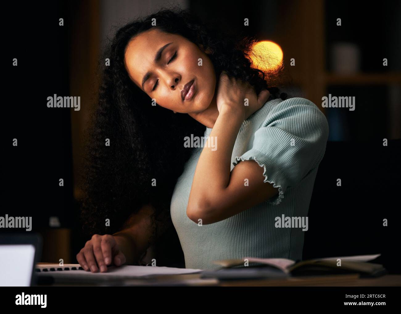Woman at office, neck pain and burnout, night work and fatigue with ...