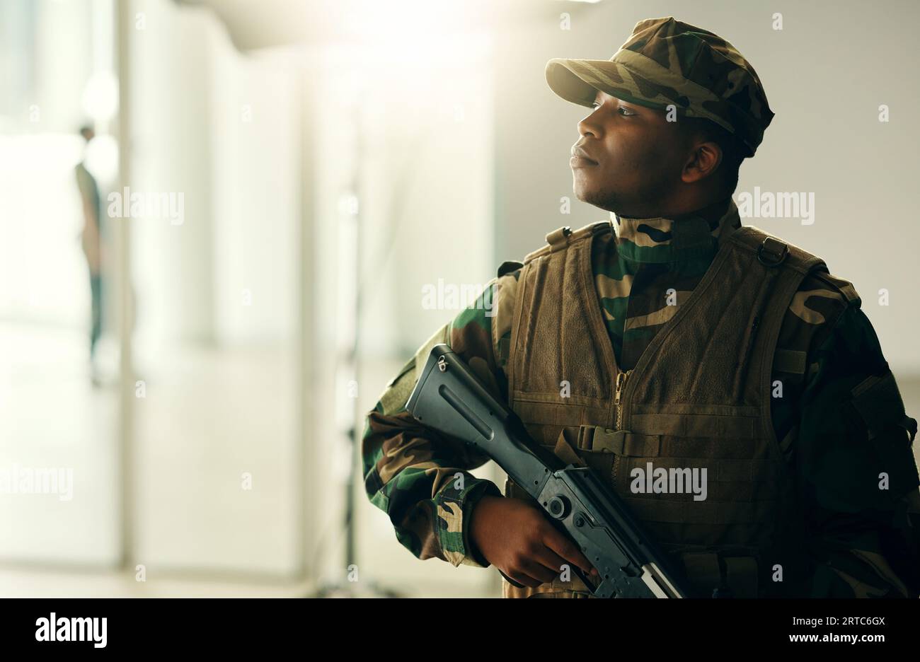 Black african man weapon gun hi-res stock photography and images - Alamy