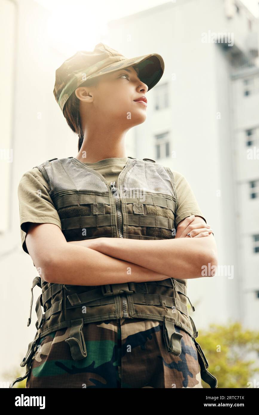 Army, thinking and arms crossed with a woman soldier in uniform for ...