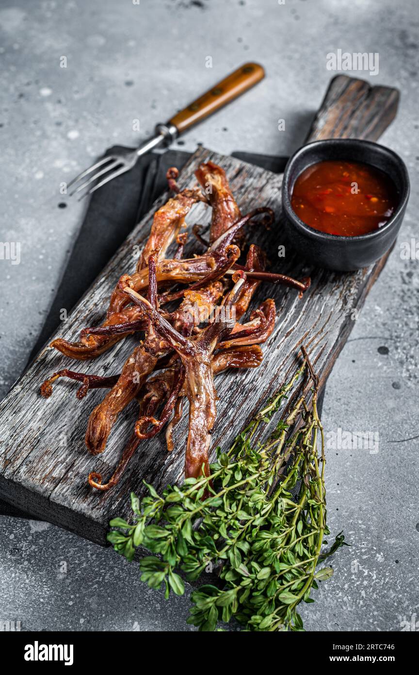 Chinese cuisine Spicy Dip fried duck tongue. Gray background. Top view ...