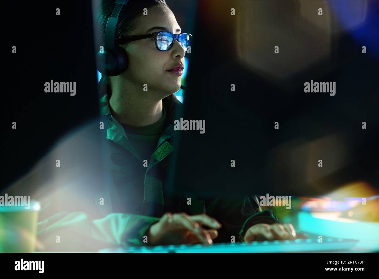 Military command center, headset and woman at computer, analysis and ...