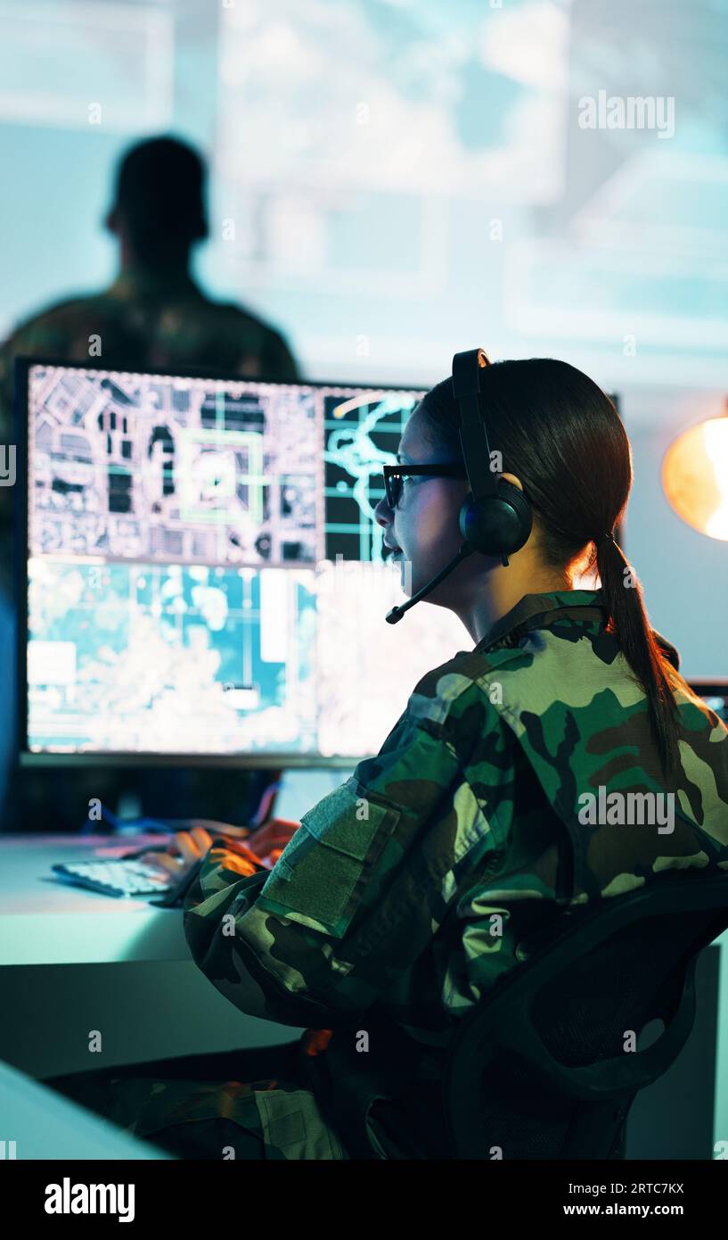 Military control room, computer screen and woman in surveillance ...
