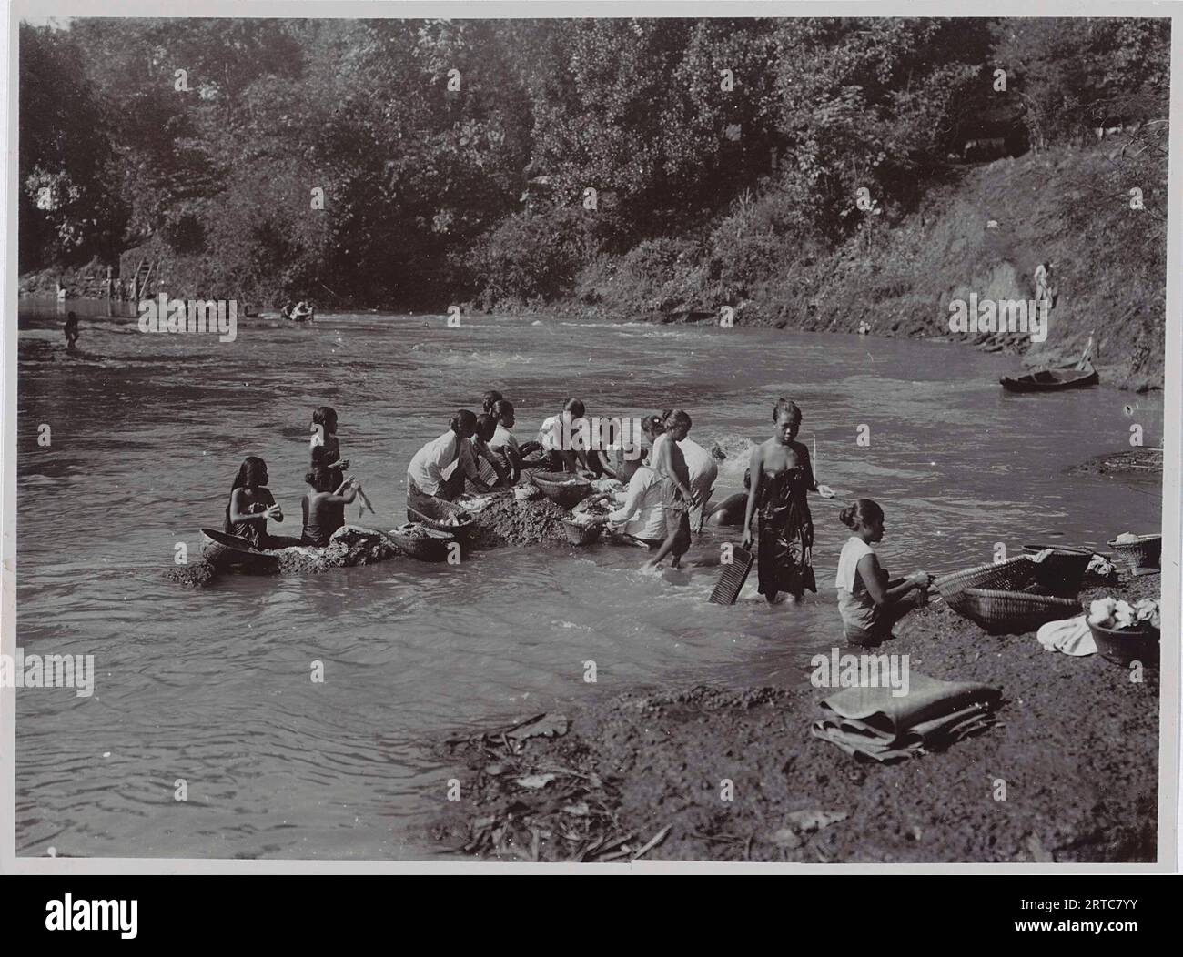 Activity on a river in Indonesia with rafts and people washing., Rural Life (possibly), 1900 ...