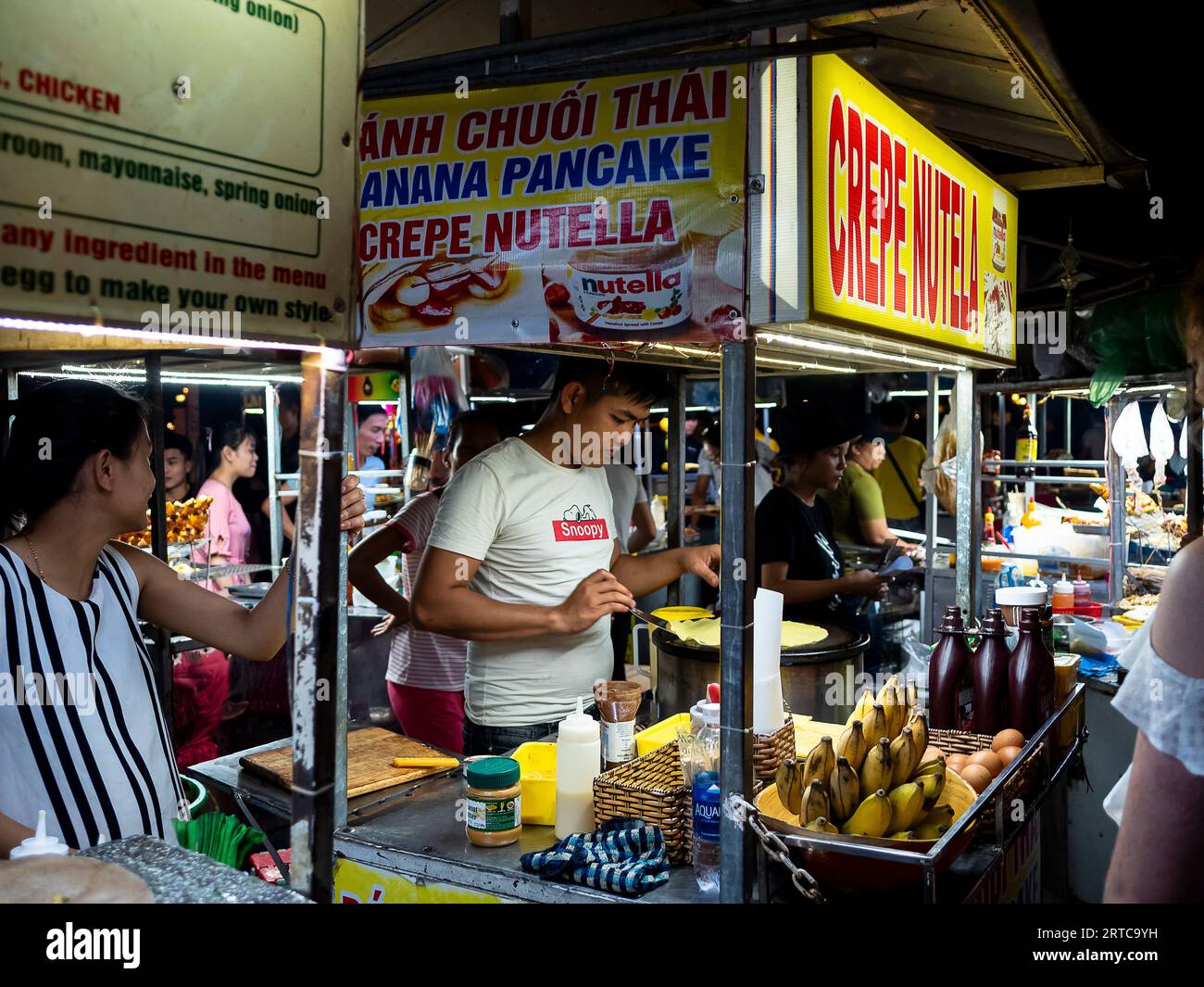 A banana crepe vendor in Hoi An vietnam Stock Photo - Alamy