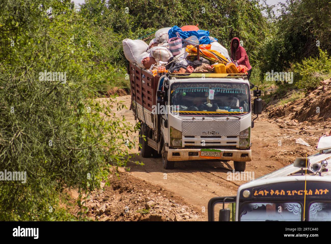 OMO VALLEY, ETHIOPIA - FEBRUARY 4, 2020: Truck waiting at the ford of ...