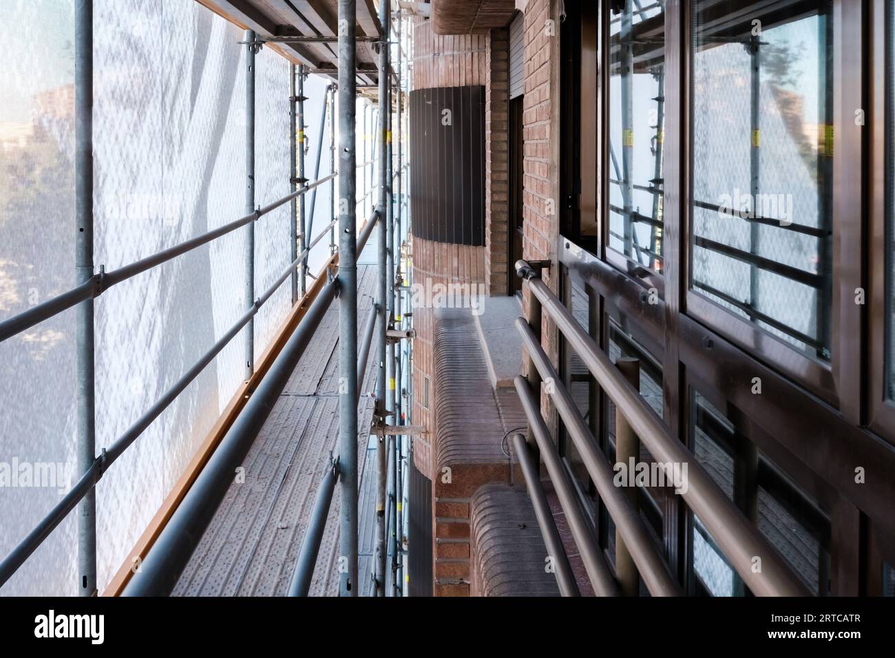 Corridors of a scaffold seen from inside a construction site Stock ...