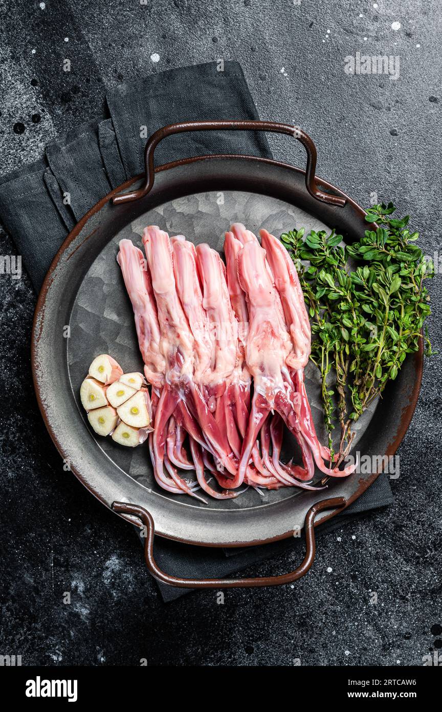 Raw Duck goose Tongue, poultry offal. Black background. Top view Stock ...