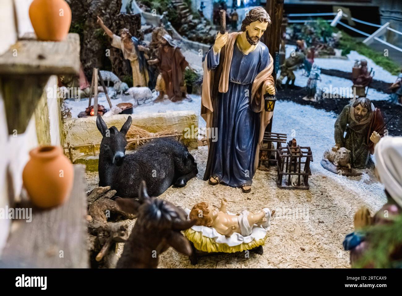 Figures of a classic nativity scene decorated with beautiful artistic ...